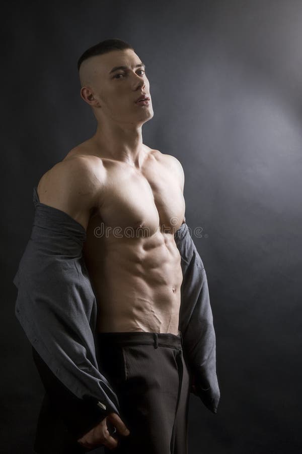 Young Man with Athletic Body on Black Background. Stock Image - Image ...