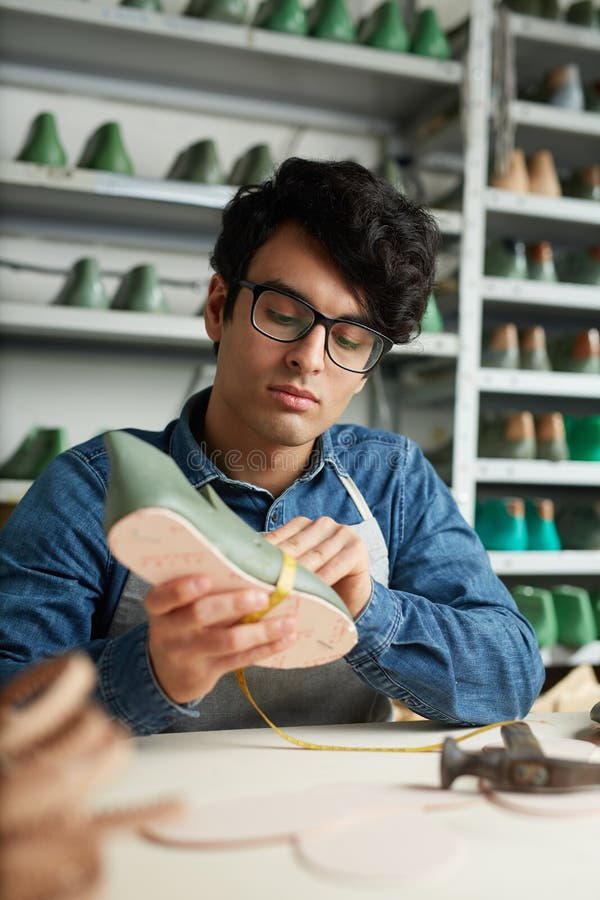 Taking measures of boot stock photo. Image of shoemaker - 102729112