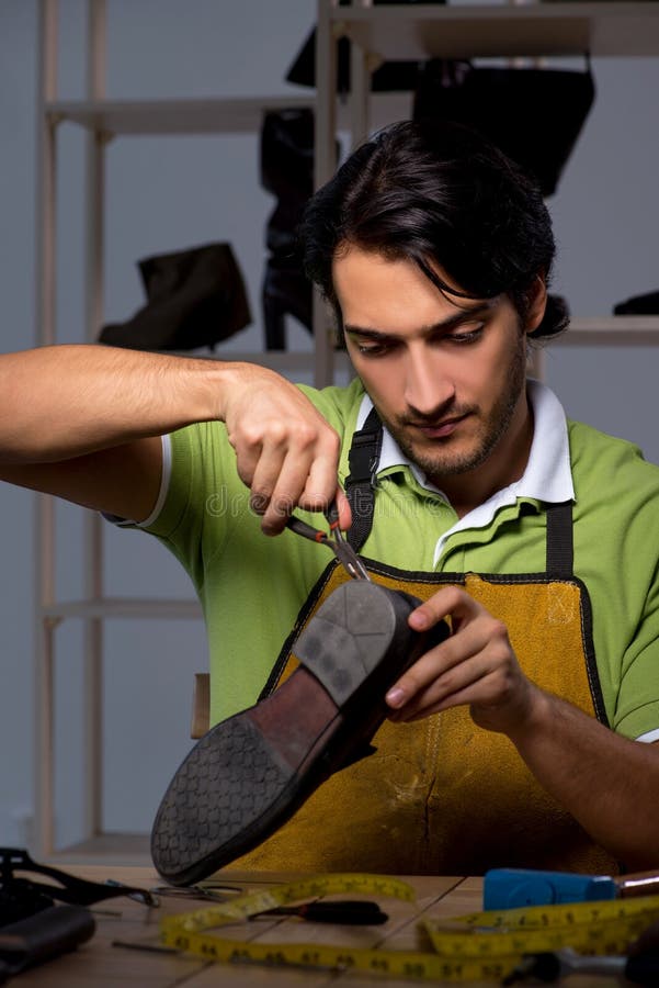 The Young Shoemaker in Workshop at Night Stock Photo - Image of maker ...
