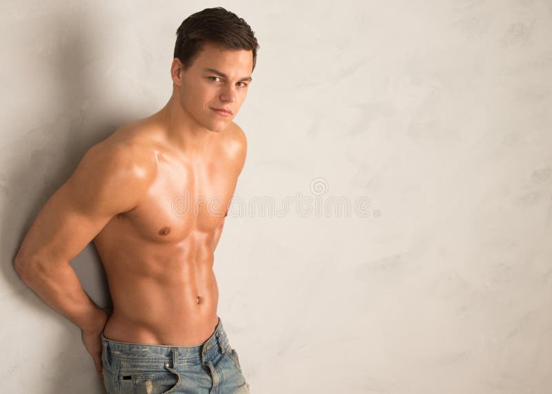 Young Shredded Man Against a Wall Stock Photo - Image of black ...