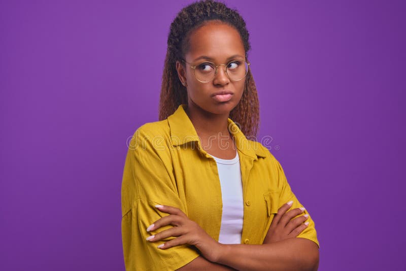 Young Shy Offended African American Woman With Arms Crossed And Pouting