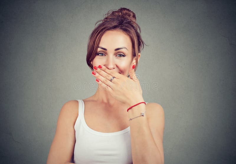 Young Shy Woman Smiling and Playfully Looking at Camera Stock Photo ...