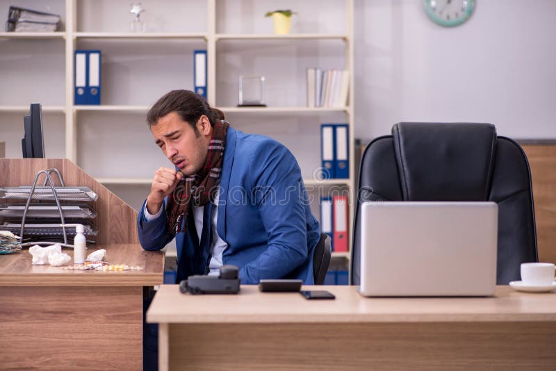 Young Sick Businessman Employee Suffering at Workplace Stock Photo ...