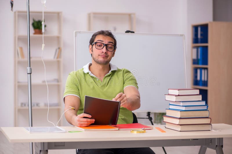 Young Sick Male Teacher Student in Blood Transfusion Concept Stock ...