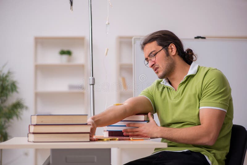 Young Sick Male Teacher Student in Blood Transfusion Concept Stock ...