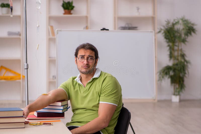 Young Sick Male Teacher Student in Blood Transfusion Concept Stock ...