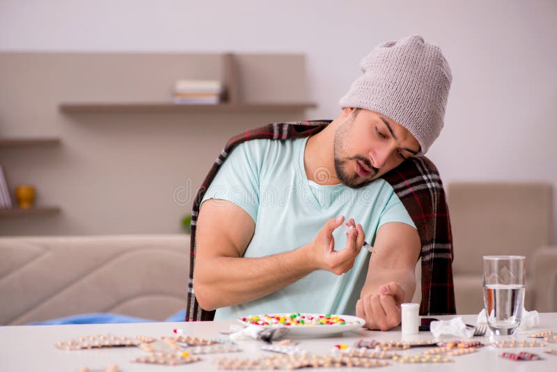 Young Sick Man Suffering at Home Stock Photo - Image of injecting, drug ...