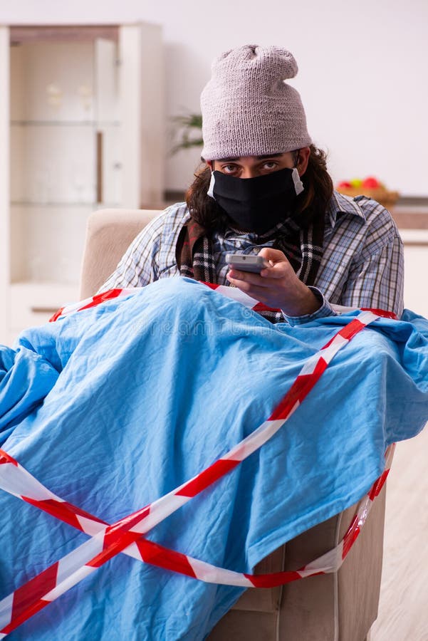 Young Sick Man Watching Tv at Home in Pandemic Concept Stock Photo ...