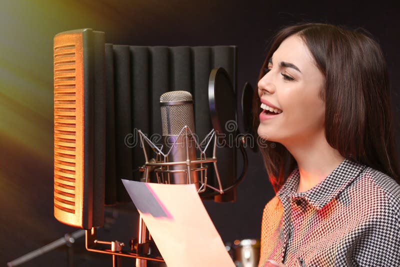 Singer with Microphone Recording Song in Studio Stock Image - Image of ...