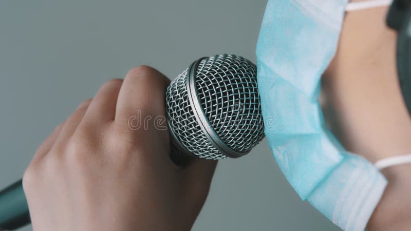 Young Singer Singing in the Microphone Fith Face Mask in Home Studio ...
