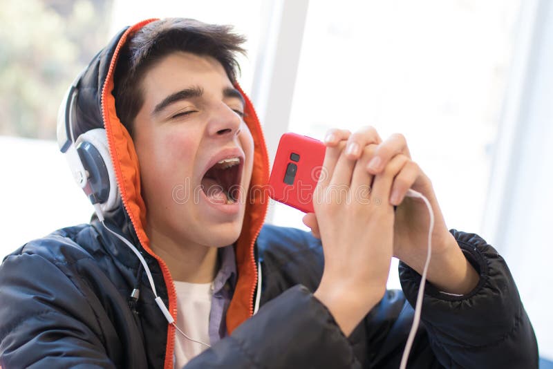 Young Man Singing with Microphone Stock Image - Image of artist, singer ...