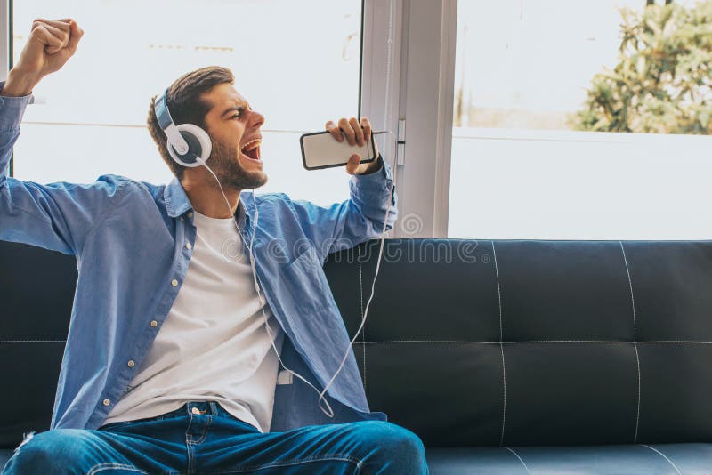 Young Man Singing with Microphone Stock Image - Image of artist, singer ...