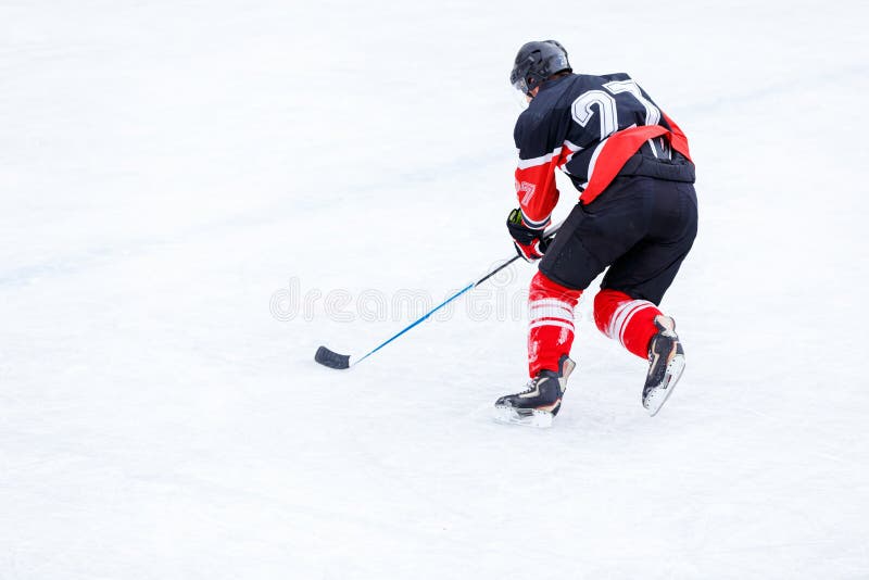 Young Skater Man in Attack. Ice Hockey Game Stock Image - Image of ...