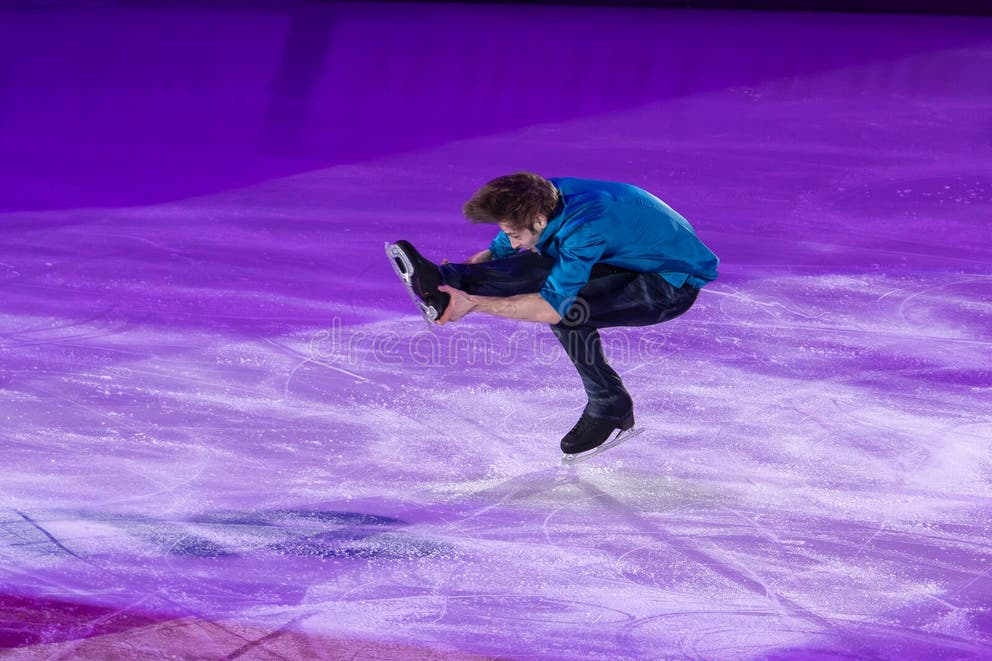 Young Skater Performing a Spin on the Ice Rink Editorial Stock Image ...