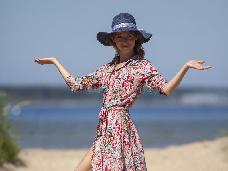 Young Slender Woman by the Sea Stock Photo - Image of hair, fashion ...