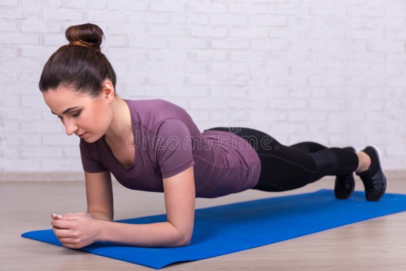 Young Slim Woman Doing Plank Exercise at Home Stock Image - Image of ...
