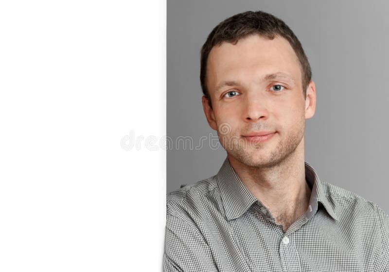 Young Smart Caucasian Man, with White Wall Stock Image - Image of smile ...
