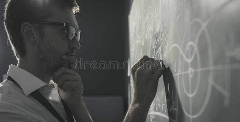 Young Smart Mathematician Drawing on the Chalkboard Stock Image - Image ...