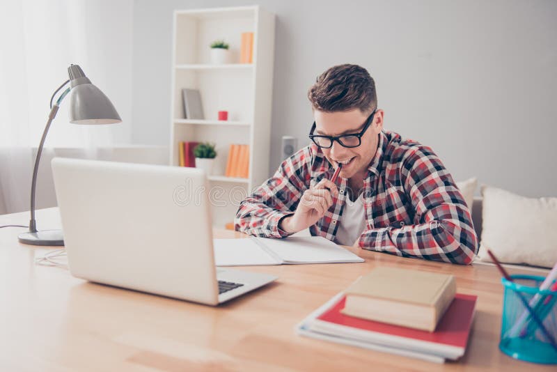 Young Smart Student in Glasses Preparing for Difficult Exam Stock Photo ...