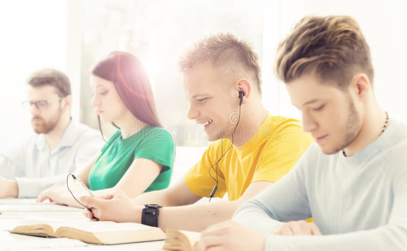 Young and Smart Students Learning in a Classroom Stock Photo - Image of ...