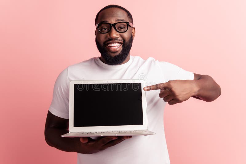 Young Smiling African Man Standing and Using Laptop Computer Direct ...