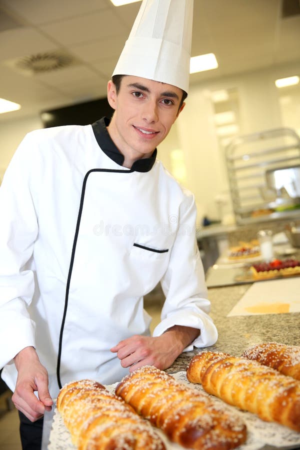 Young smiling baker stock image. Image of confectionary - 32144883