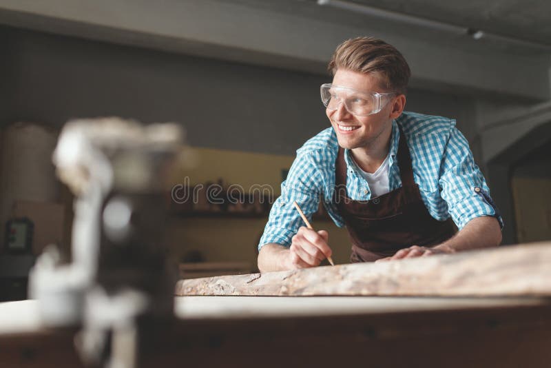 Smiling carpenter stock image. Image of carpenter, sculpting - 23062537