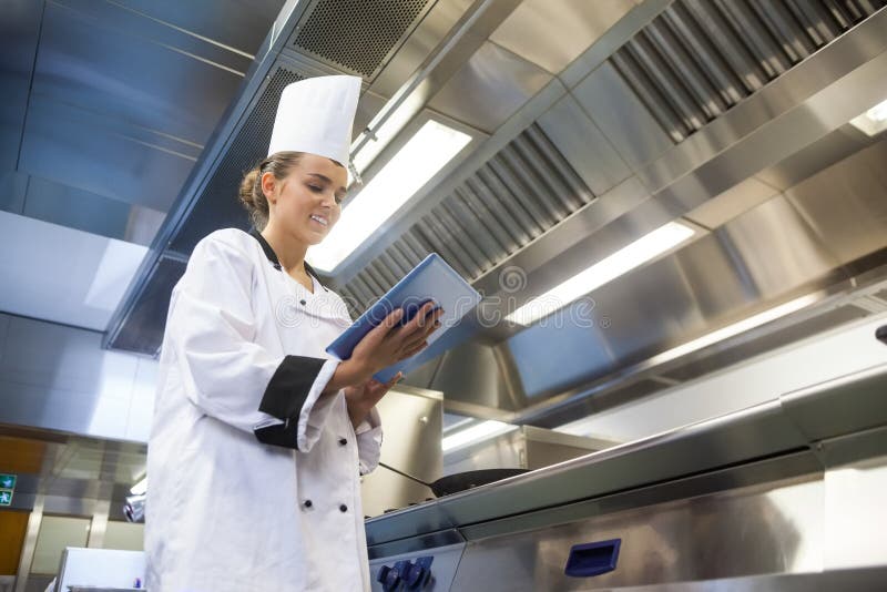 Young Smiling Chef Using Tablet Stock Photo - Image of commercial ...