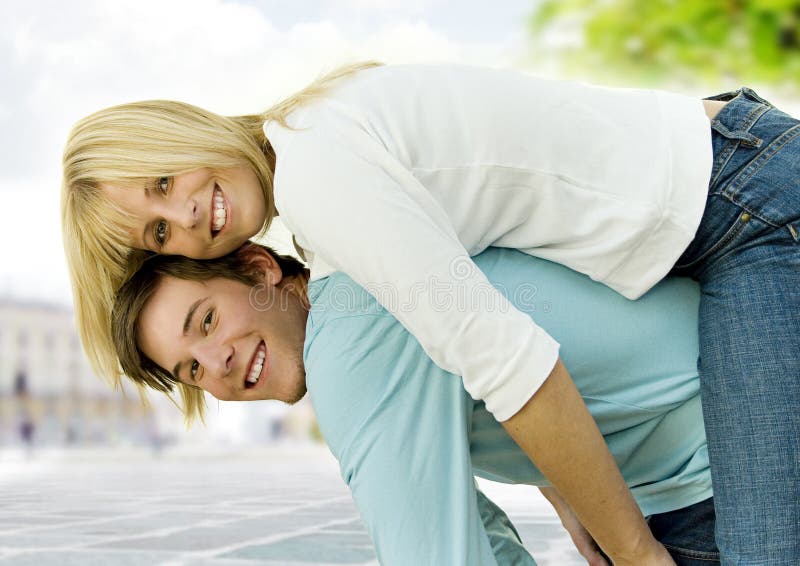 Young Man Carrying Woman Pickaback Smiling Stock Photos - Free ...