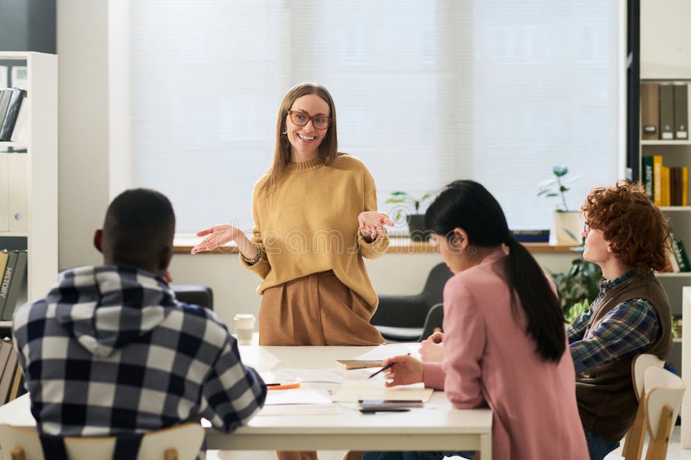 Educator Teaching Foreign Languages To Diverse Classroom Group Stock ...