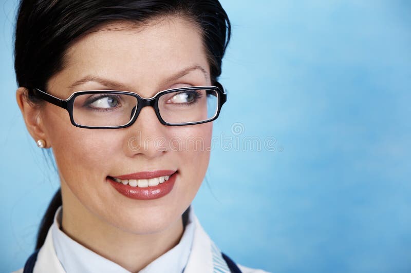 Young Smiling Female Doctor Stock Photo - Image of pensive, hair: 4480456