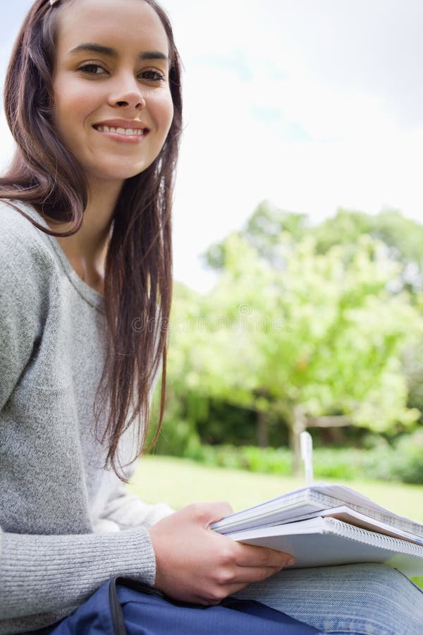 Young Smiling Girl Doing Her Homework Stock Image - Image of adult ...