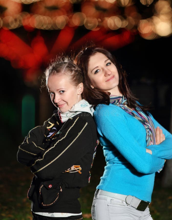 Young Smiling Girls in the Night Park Stock Image - Image of beauty ...