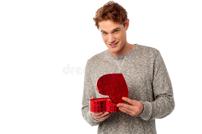 Young Smiling Guy Holding Gift Box Stock Image - Image of model, gift ...
