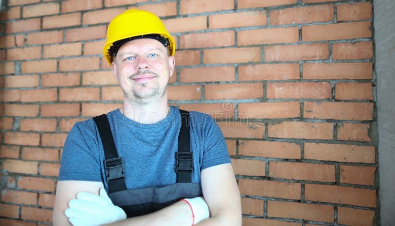 Young Smiling Handsome Constructor Builder Foreman Folding Hands Stock ...