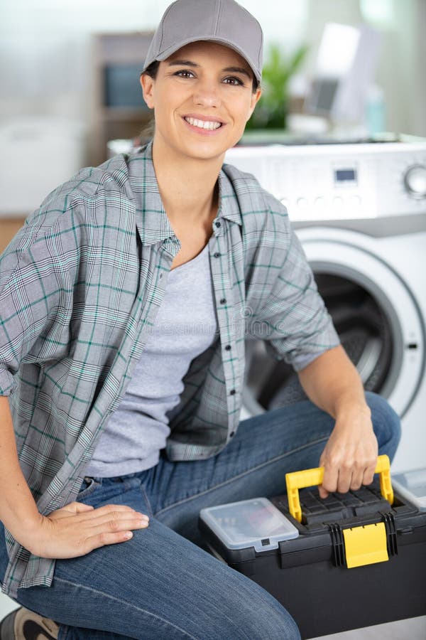 Young Smiling Handywoman Holding Toolbox Stock Photo - Image of ...
