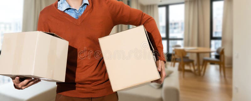 Young Smiling Logistic Delivery Man Holding the Box Stock Image - Image ...