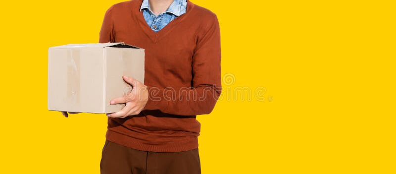 Young Smiling Logistic Delivery Man Holding the Box Stock Photo - Image ...