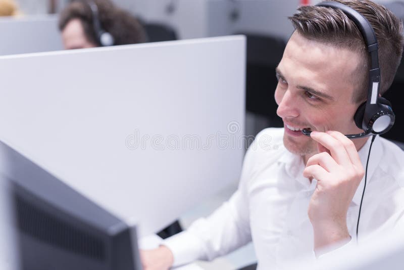 Male Call Centre Operator Doing His Job Stock Photo - Image of ...