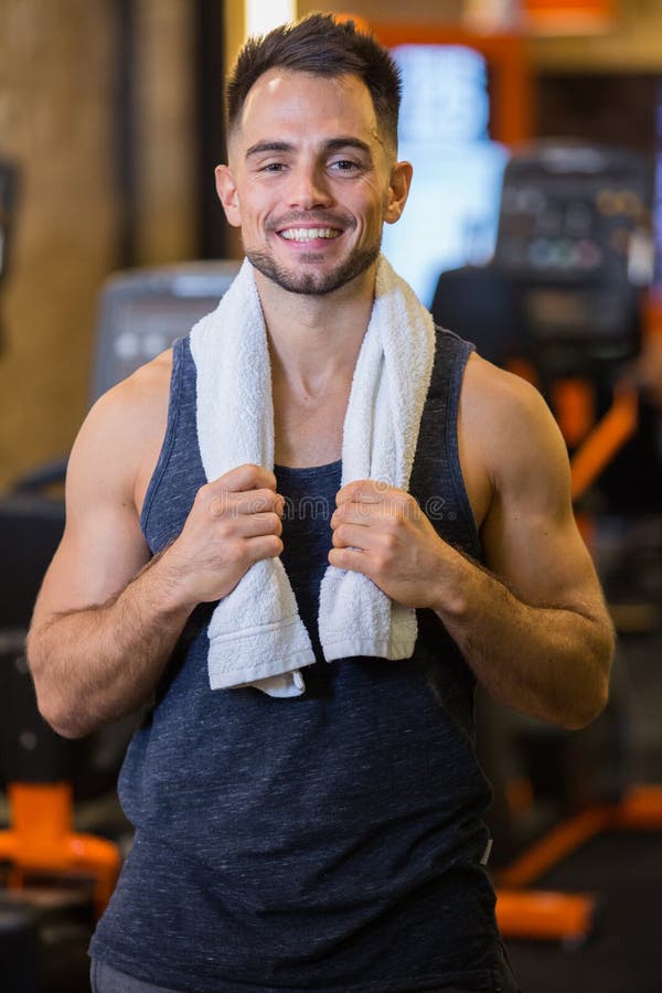Young smiling man in gym stock image. Image of active - 202016367
