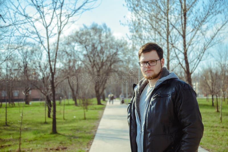 Young Smiling Man in Spring Park. Stock Image - Image of adult, cute ...