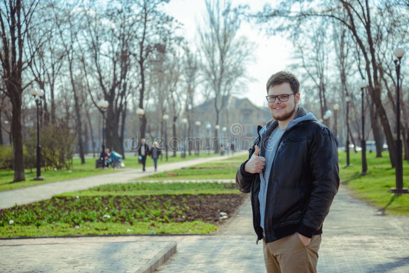 Young Smiling Man in Spring Park. Stock Photo - Image of cute, copy ...
