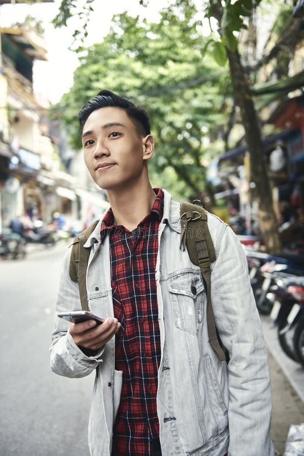 Young Man Using Digital Map instead of Paper One Stock Image - Image of ...