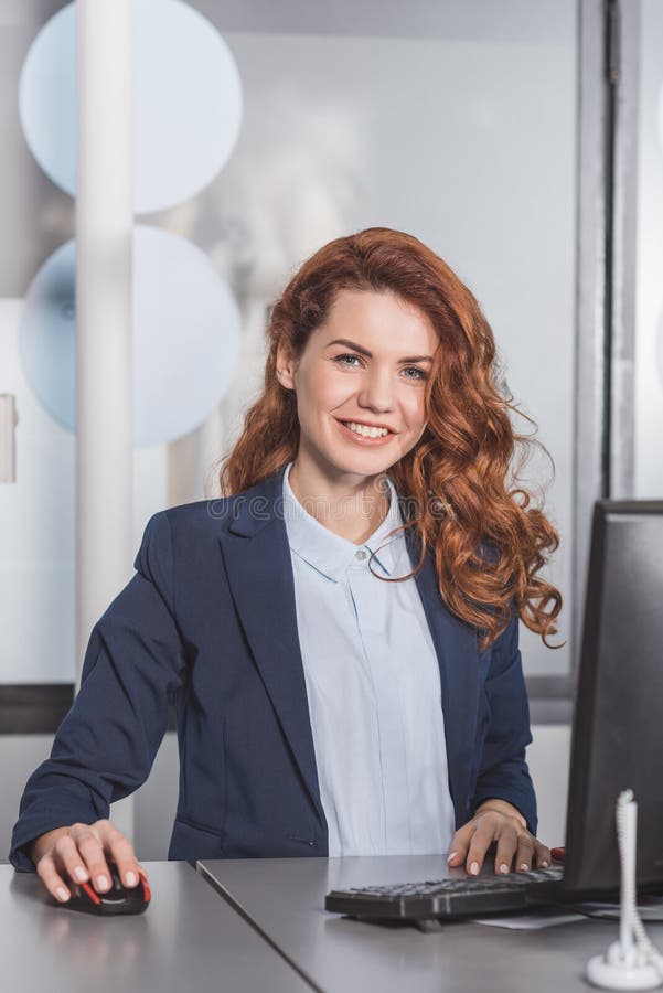 Young Smiling Manageress Using Stock Photo - Image of happy, working ...