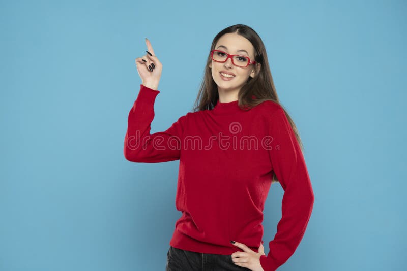 Young Smiling Student Pointing on a Blue Space Stock Photo - Image of ...