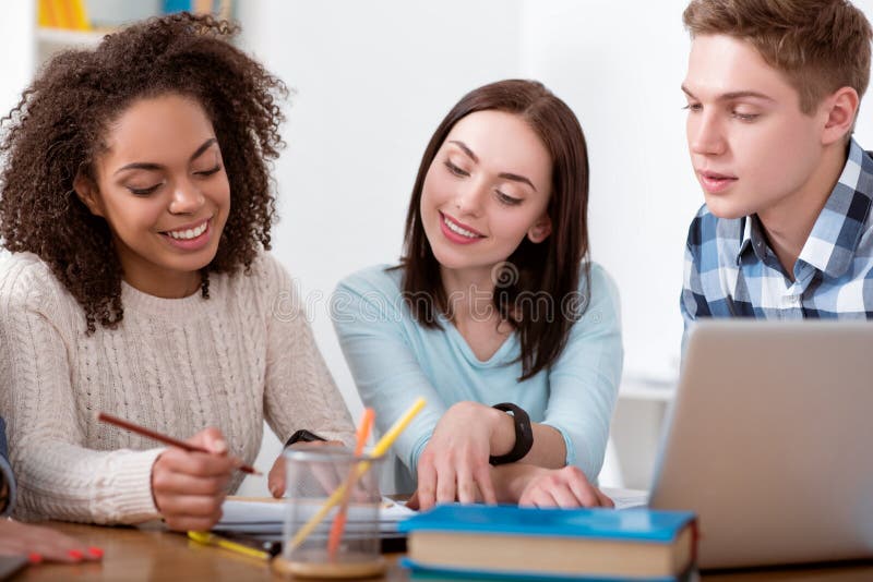 Young and Smiling Students Studying in the Class Stock Photo - Image of ...