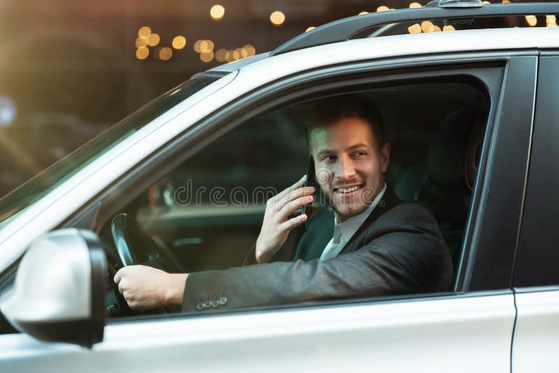 Young Smiling Successful Businessman Having Pleasant Phone ...