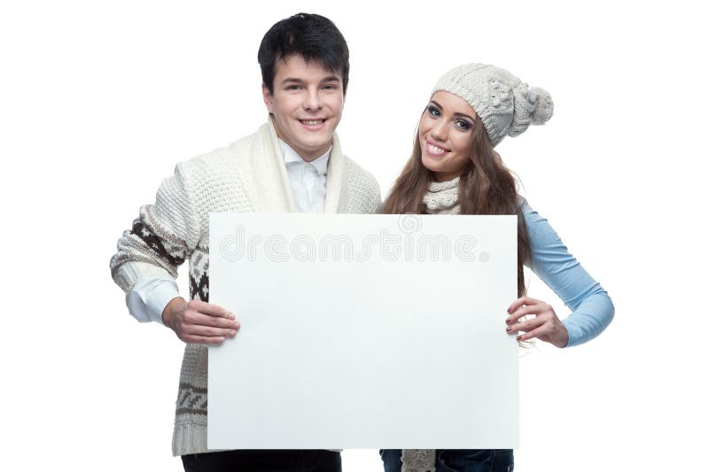 Young Smiling Winter Couple Holding Big Sign Stock Image - Image of ...