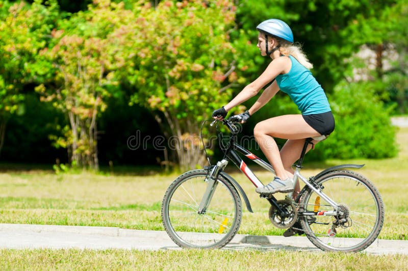 Young Smiling Woman on Bike Stock Photo - Image of lifestyle, fresh ...