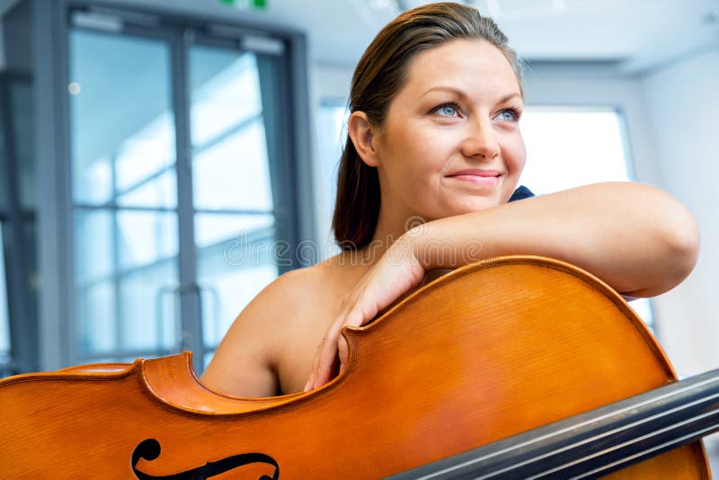 Woman with a cello stock photo. Image of music, care - 133319348